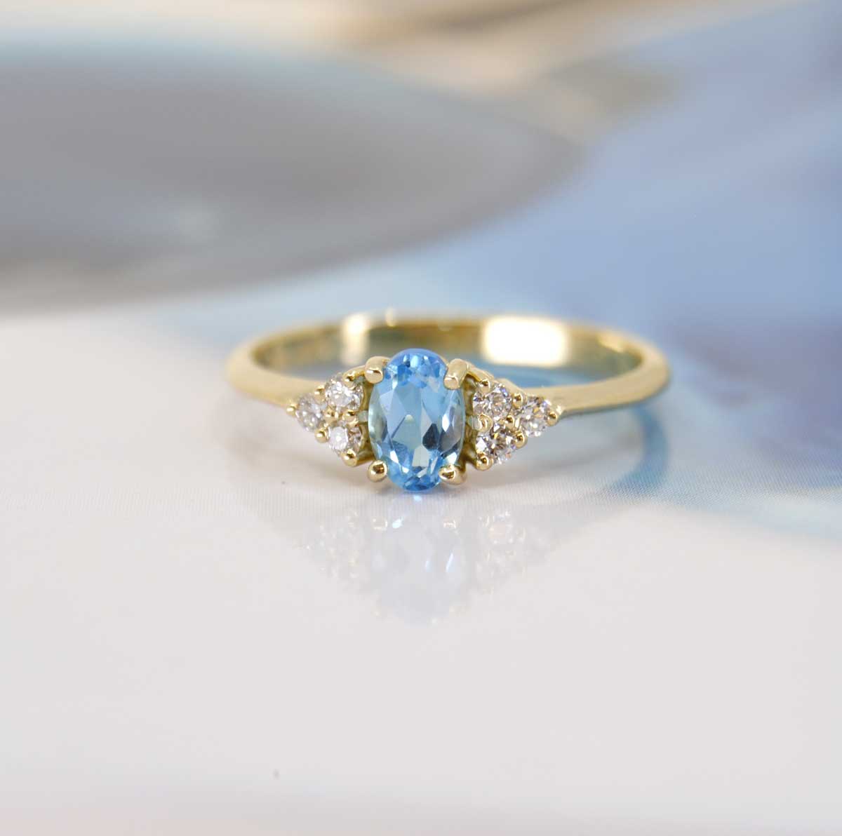 Geelgouden ring Belize met Swiss Topaas - Edelsmederij wim van Geel